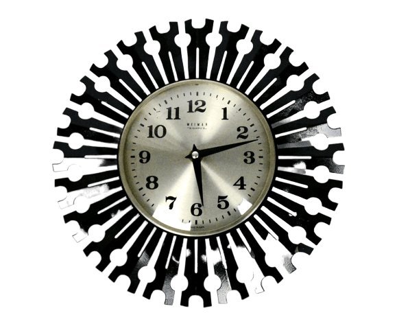 Metal sun-shaped wall clock for Weimar, 1970s | €100 | Whoppah