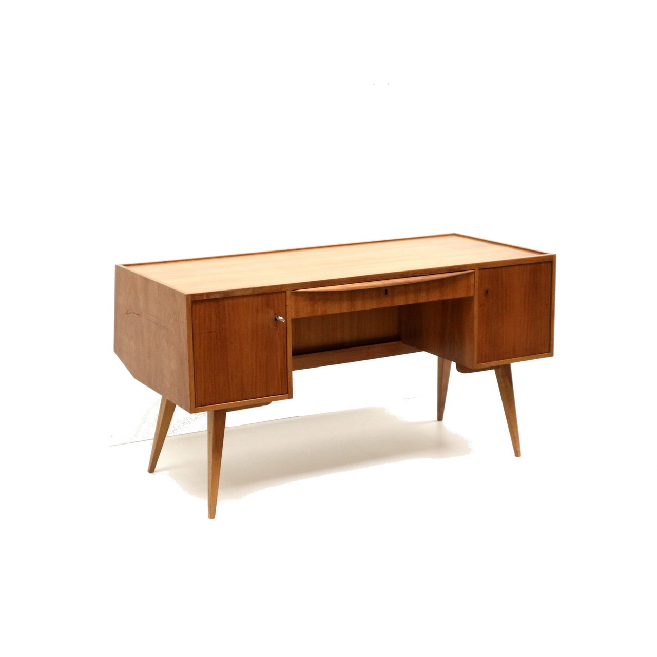Large vintage desk with angled legs made in the 1970s | €995 | Whoppah