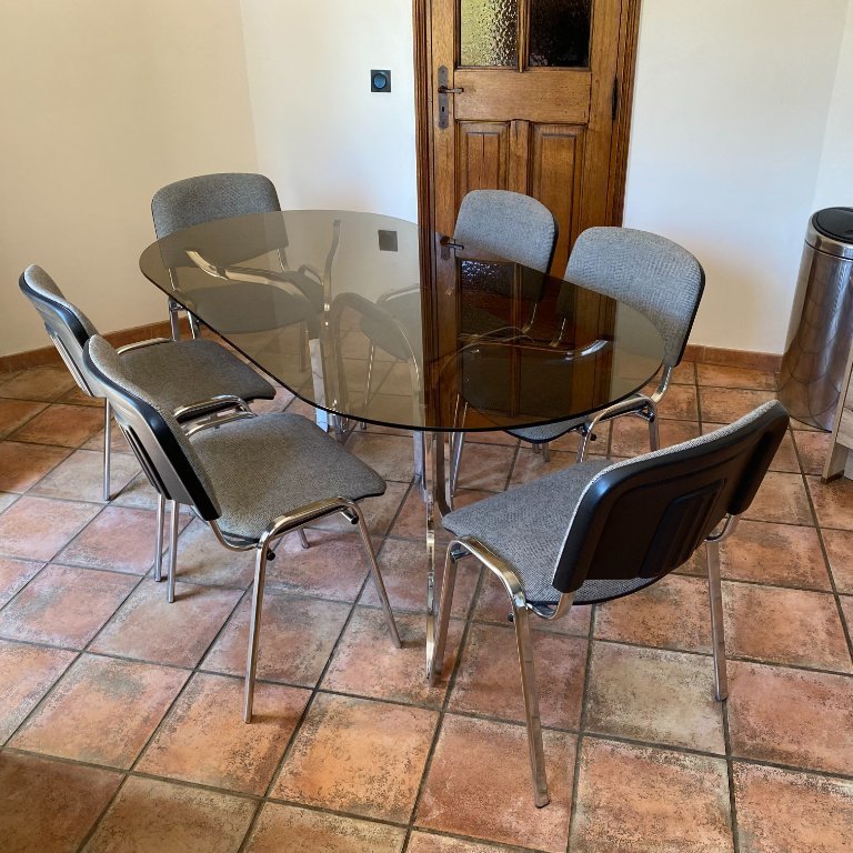 Table Roche Bobois et ses 6 chaises. 1970. 180x90. | €760 | Whoppah