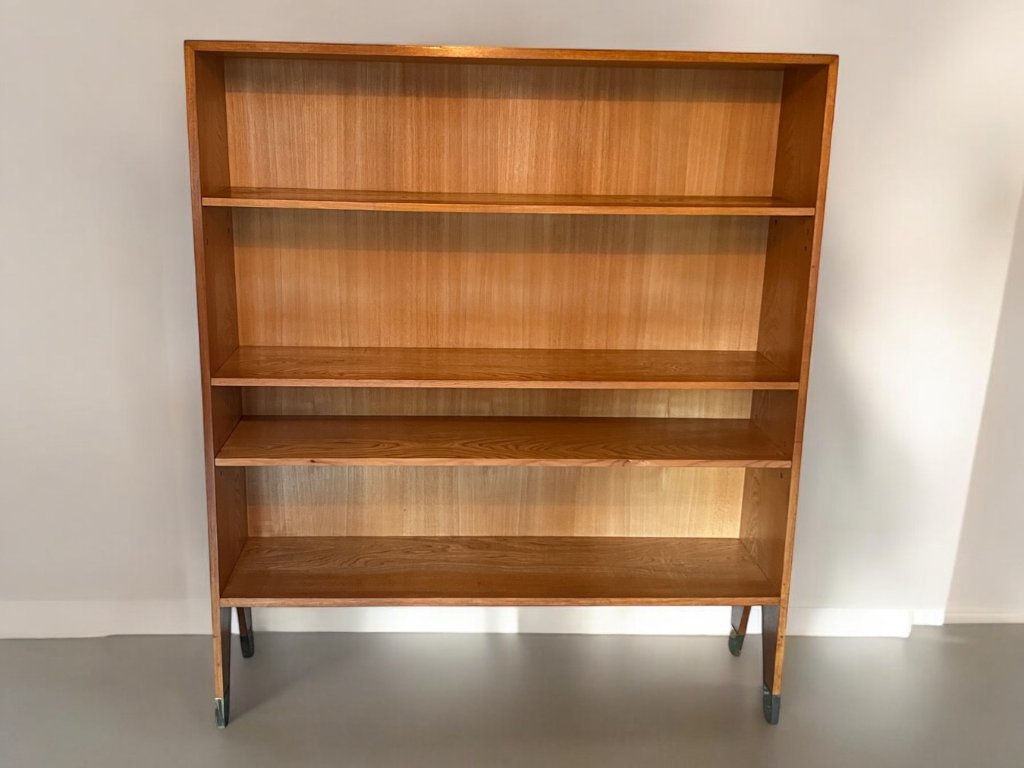Mid - Century tapered bookcase with brass shoes. Very high quality ...