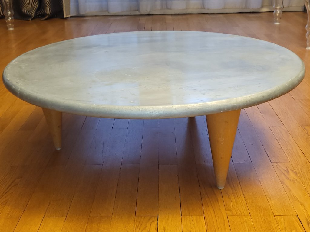 Round coffee table by Sir Terence Conran in zinc, 1997 | €1,080 | Whoppah