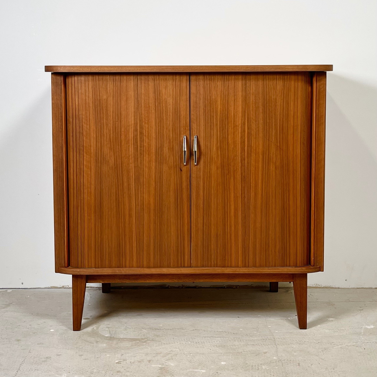 Teak Finished Rolling Door Cabinet In Scandinavian Style | €489 | Whoppah