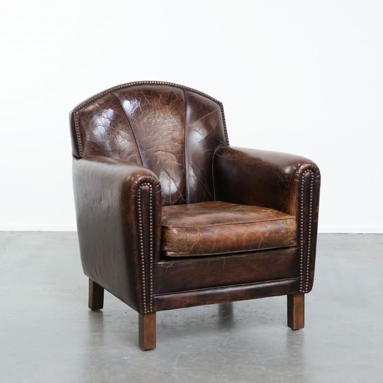 Cowhide armchair with character and a timeless look | €995 | Whoppah