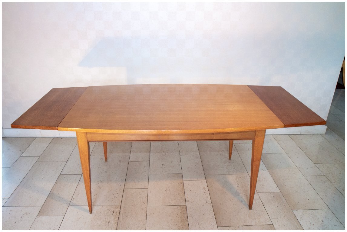 Curved table with extensions, light oak, 1960s | €765 | Whoppah