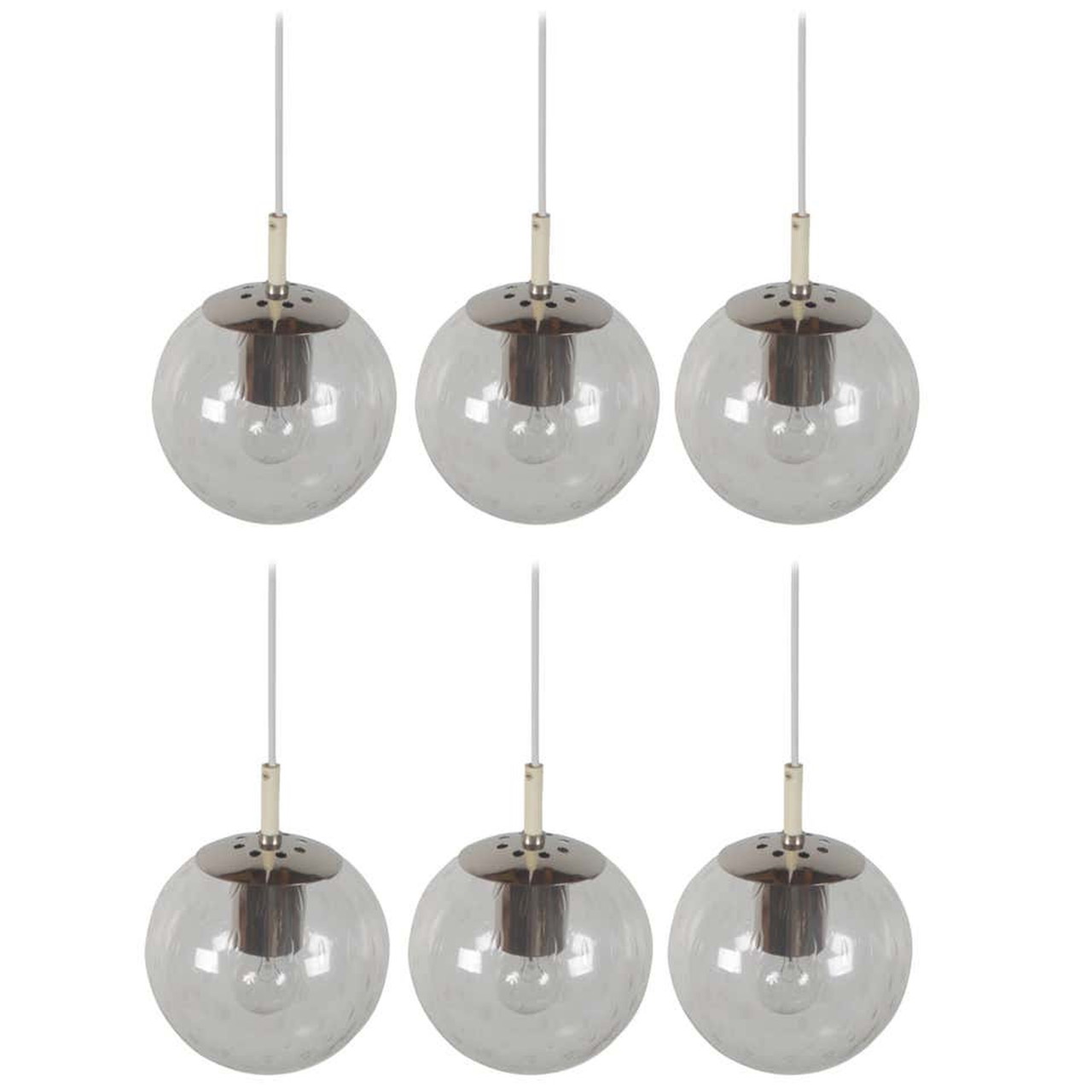 Licht-druppels' wereldbol hanger van Raak | €425 | Whoppah