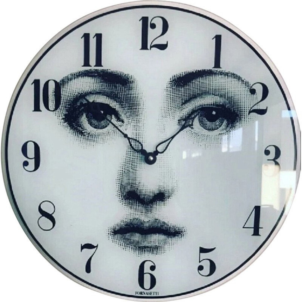 Vintage Viso wall clock by Fornasetti for Lina Cavalieri | €420 | Whoppah