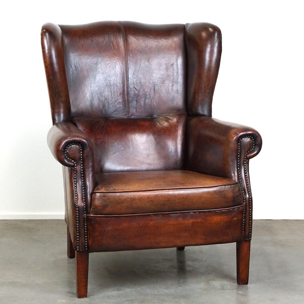 Large sheep leather ear chair with fixed seat cushion | €1,280 | Whoppah